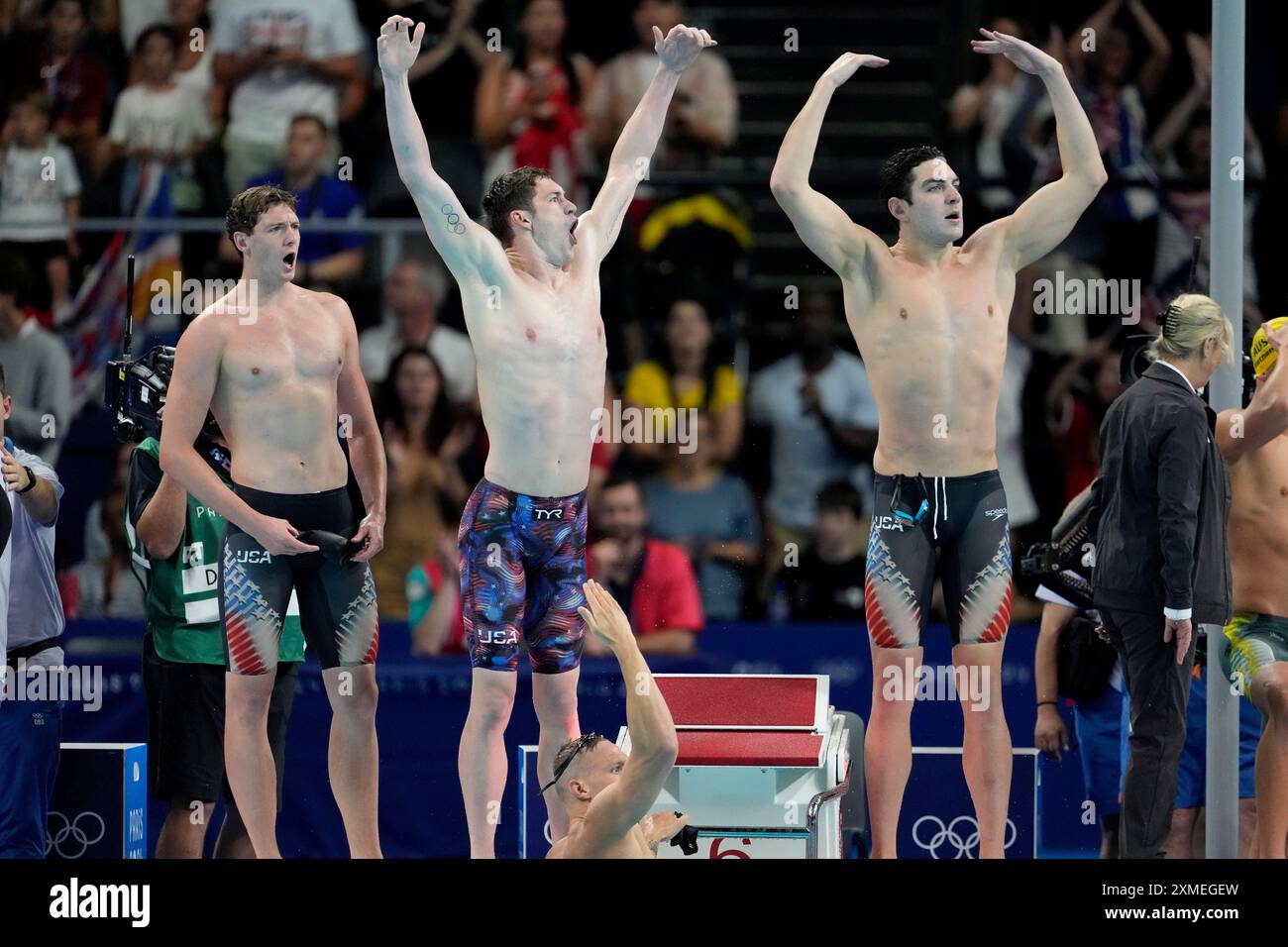 The United States men's 4x100-meter freestyle relay team react after ...