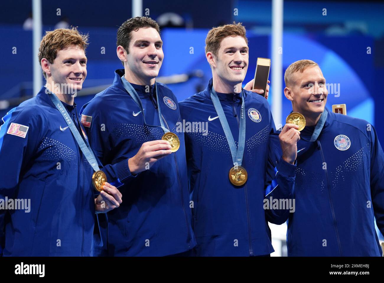 Team USA celebrate with their gold medals after winning the Men's 4 x ...