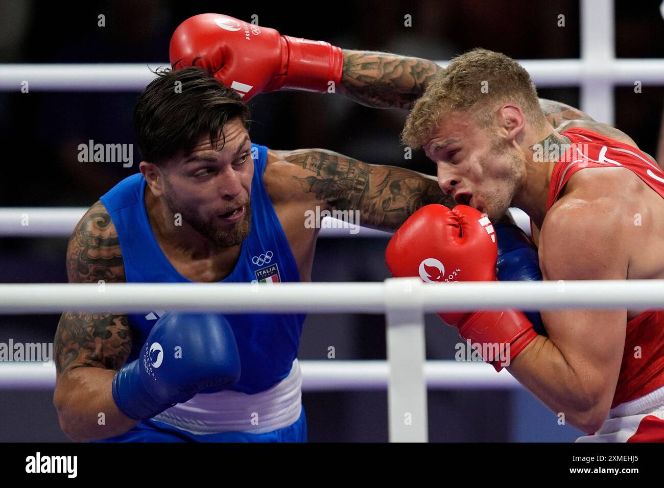 Italy's Salvatore Cavallaro hits Turkey's Kaan Aykutsun in their men's ...
