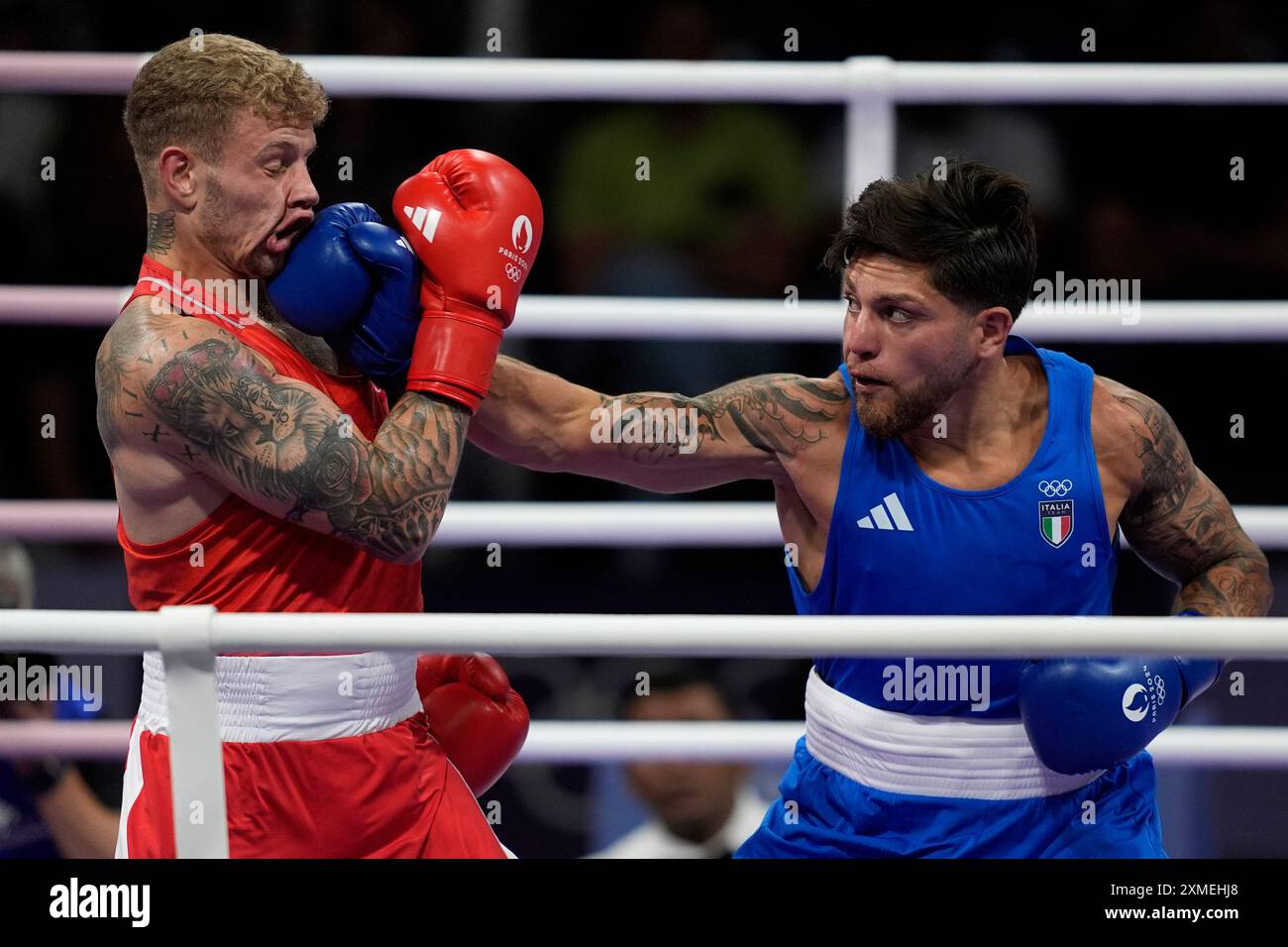 Italy's Salvatore Cavallaro hits Turkey's Kaan Aykutsun in their men's ...