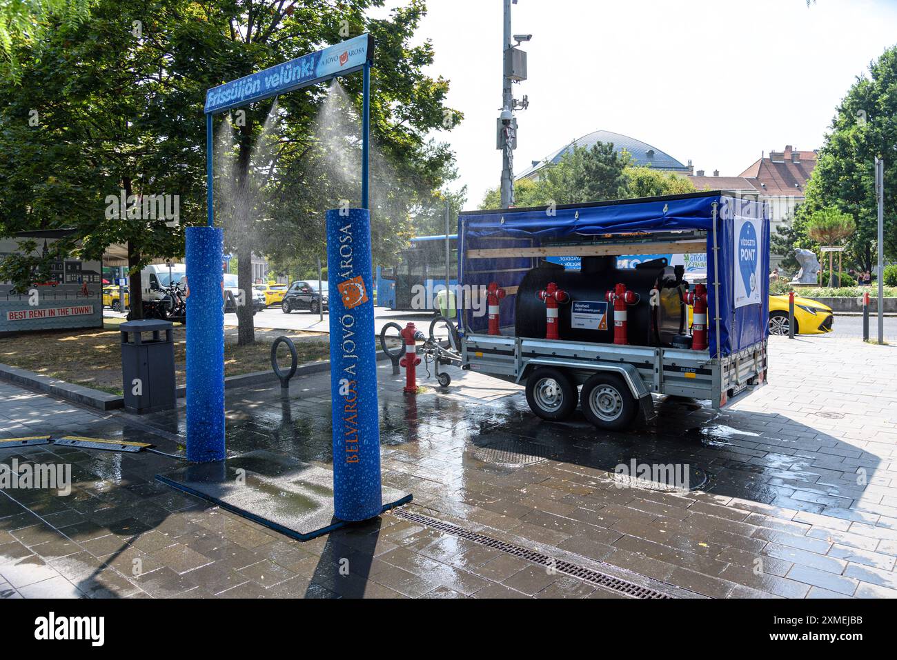 A mist gate and temporary water station erected in central Budapest ...