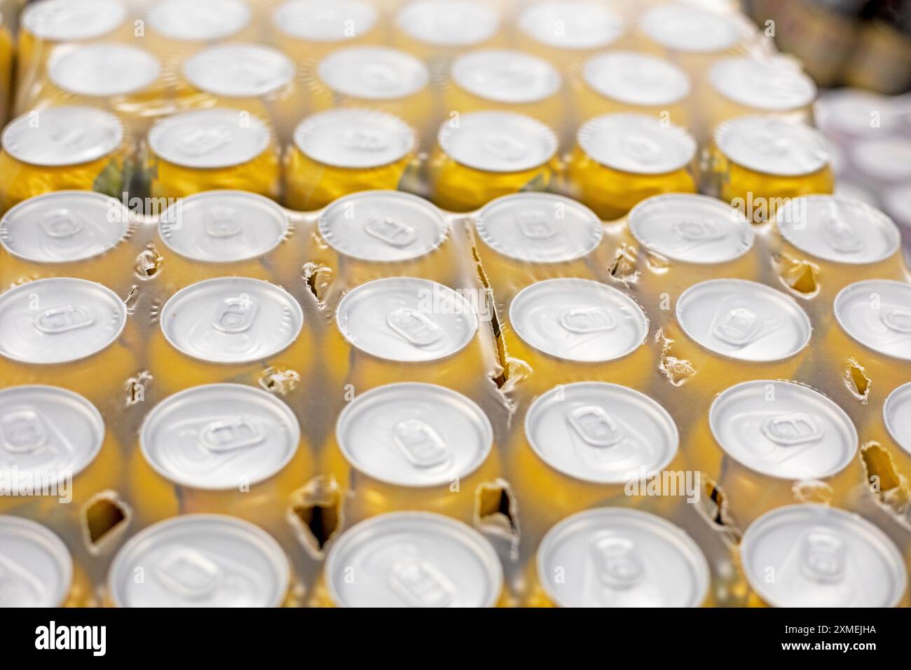 packaged energy drink or beer in yellow aluminum containers Stock Photo ...