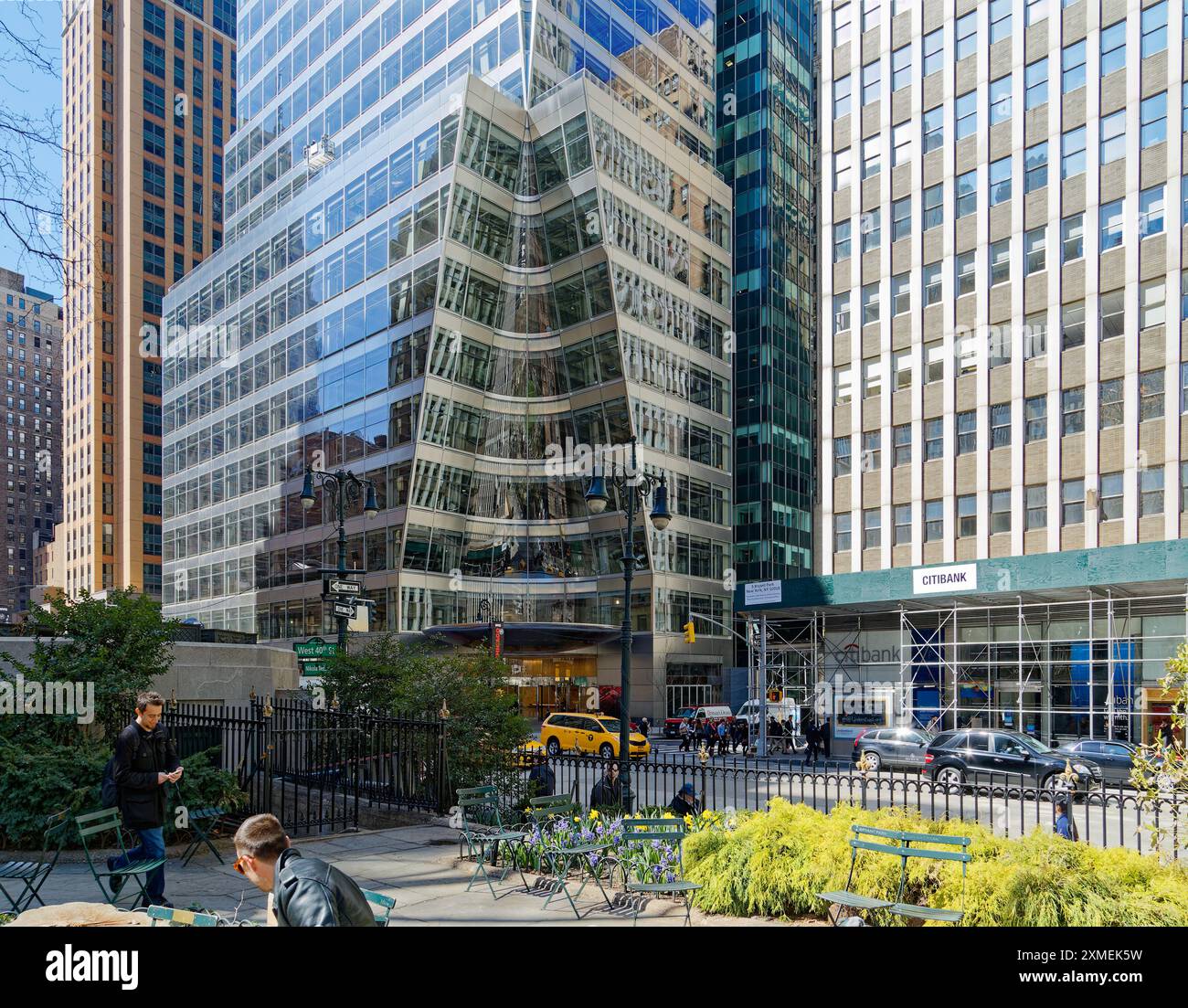 A cone is sculpted from the corner of 7 Bryant Park above the circular ...