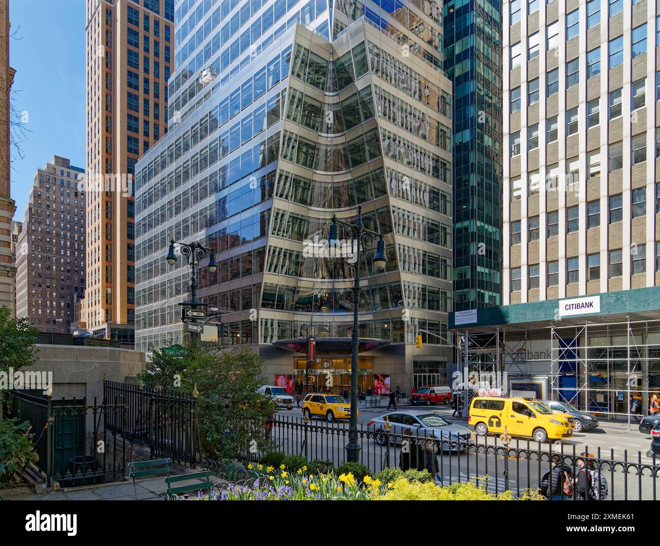 A cone is sculpted from the corner of 7 Bryant Park above the circular ...