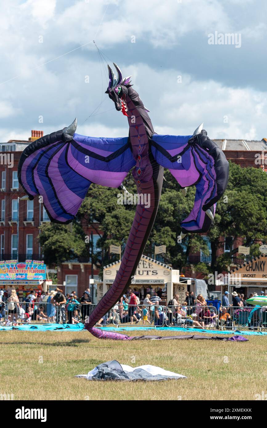 Kite festival on Southsea common in Portsmouth. These are dragon shaped ...