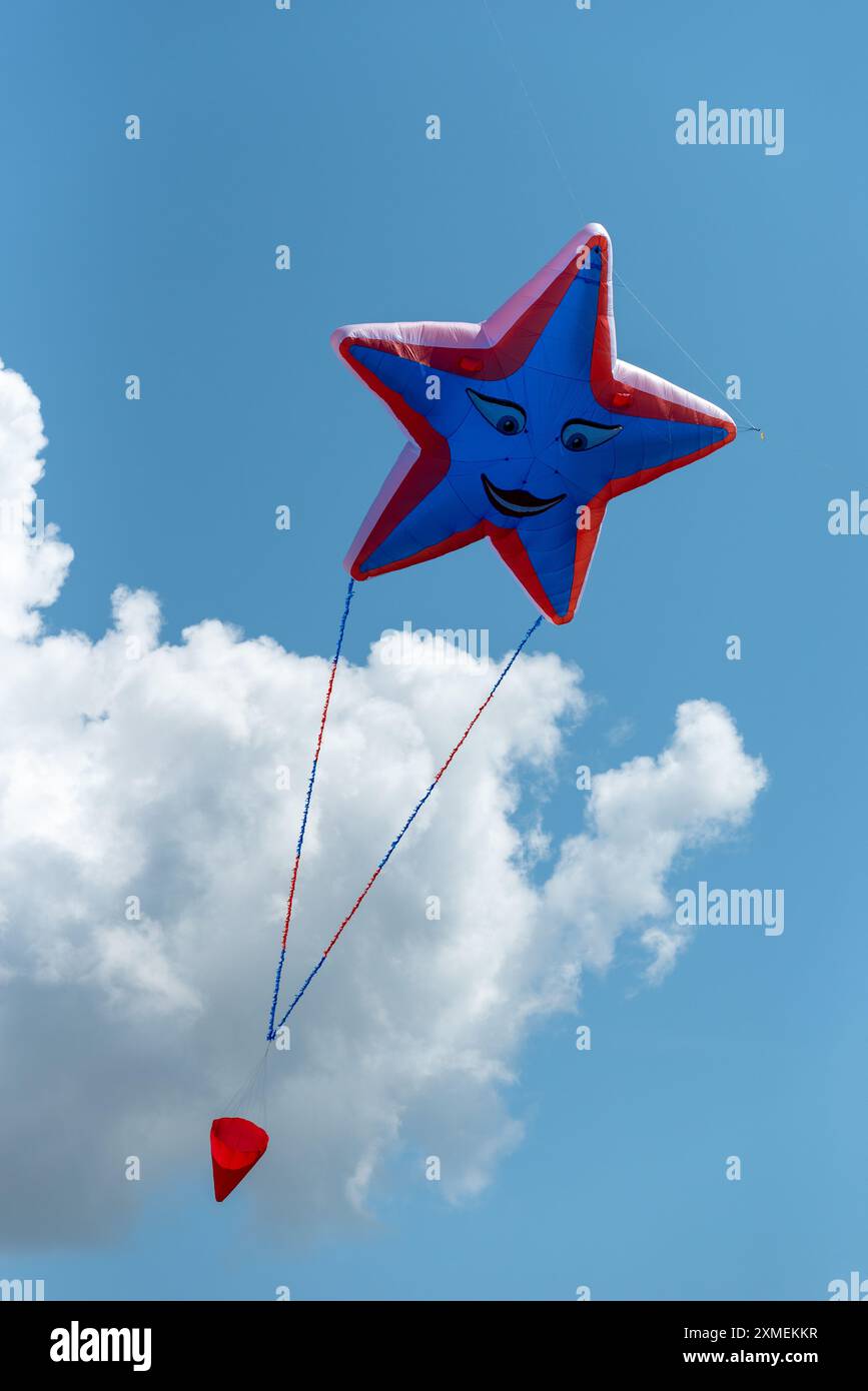 Kite festival on Southsea common in Portsmouth. This is a single red ...