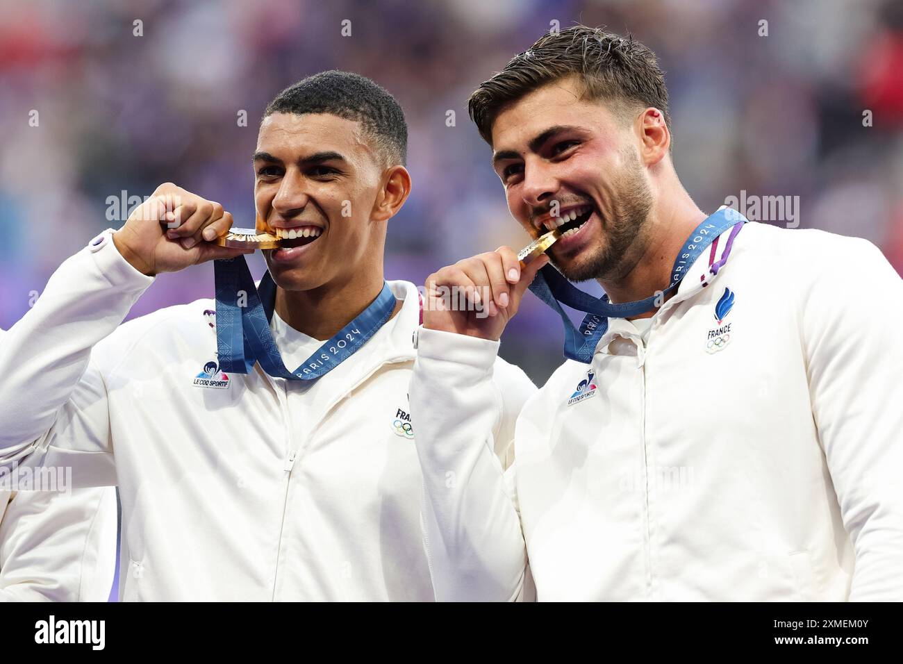Paris, France, 27 July, 2024. French players bite their Gold medals ...