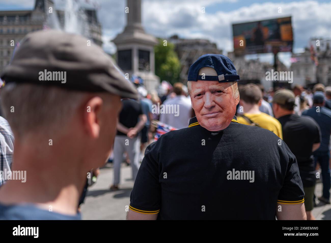 London, UK. 27th July, 2024. A demonstrator seen wearing a Donald Trump ...
