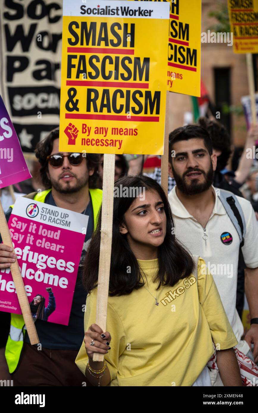 Stand Up To Racism demonstrators march in counter demonstration to ...
