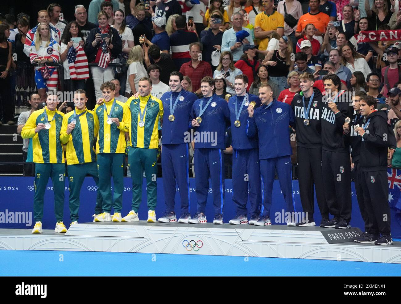 Paris, France. 27th July, 2024. Silver medalists Australia (L), gold medalist U.S. (C) and ...