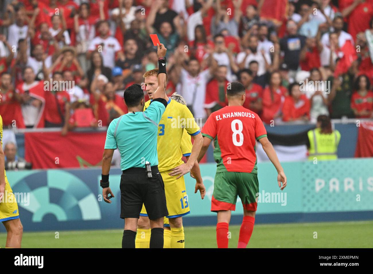 Said Martinez (referee) gives a red card to Volodymyr Salyuk (Ukraine ...