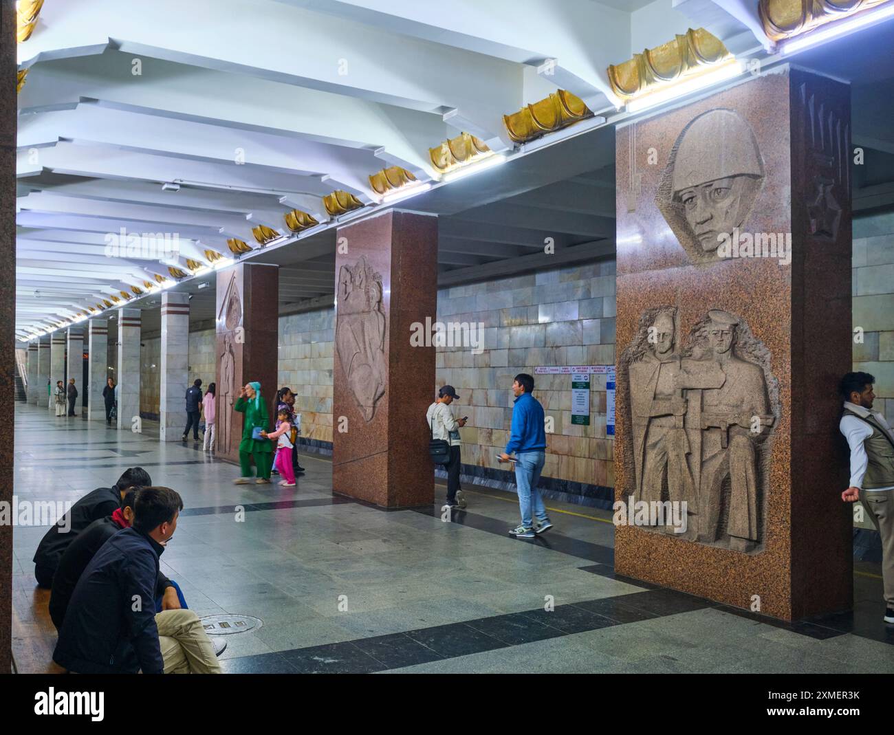 Columns with marble friezes of soldiers. At the Olmazor station of the ...