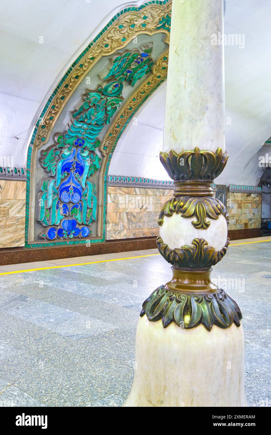 Detail view of marble work of a light column and the banded tile ...
