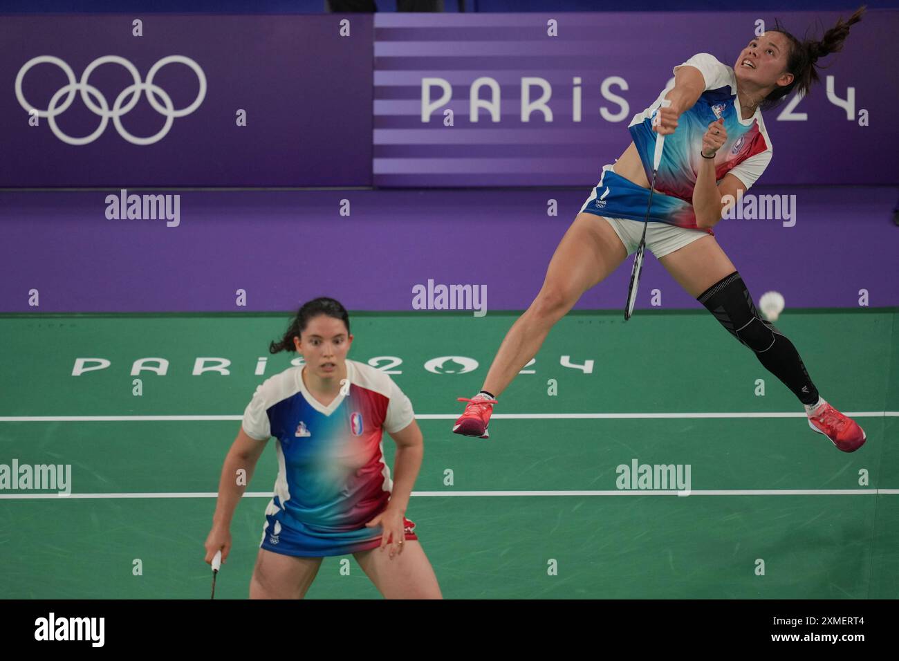 France's Margot Lambert, left, and Anne Tran play against Thailand's ...