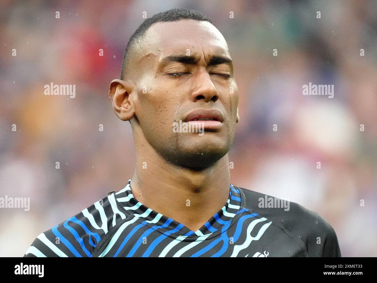 Paris, France. 27th July, 2024. Joseva Talacolo of Team Fiji sings ...