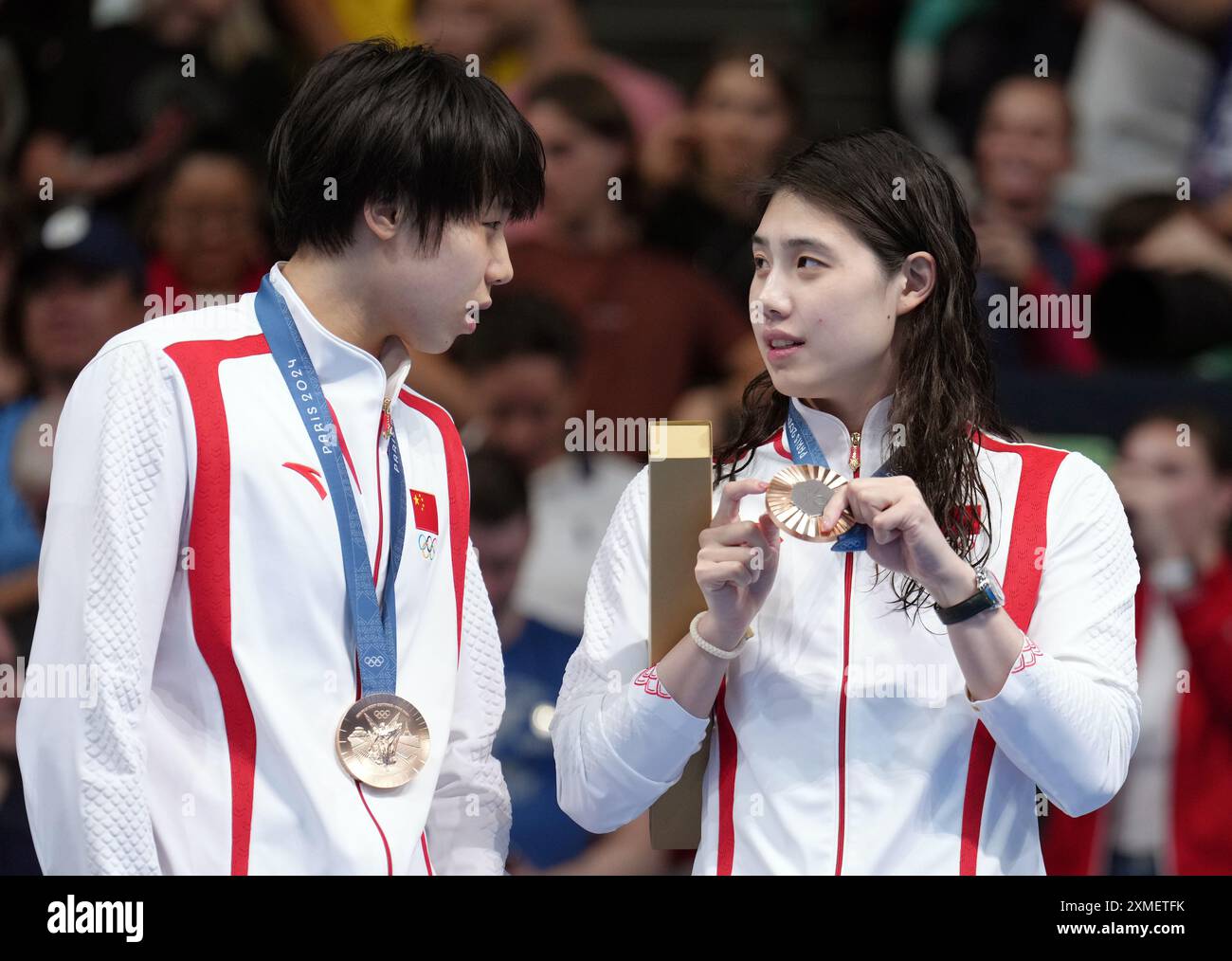 Paris, France. 27th July, 2024. Bronze medalists Zhang Yufei (R) and Yang Junxuan of Team China ...