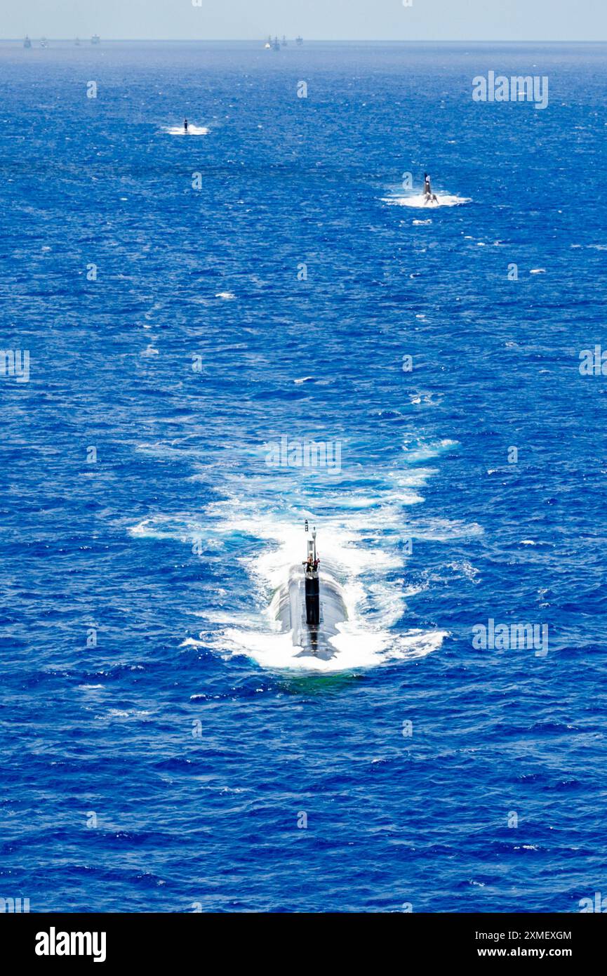 Los Angeles-class submarine USS Topeka (SSN 754) sails in formation ...