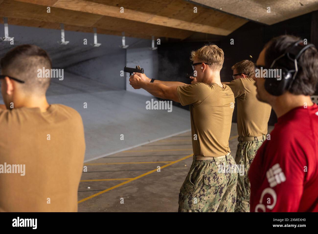 United States Naval Academy Midshipman conduct a live-fire range with ...