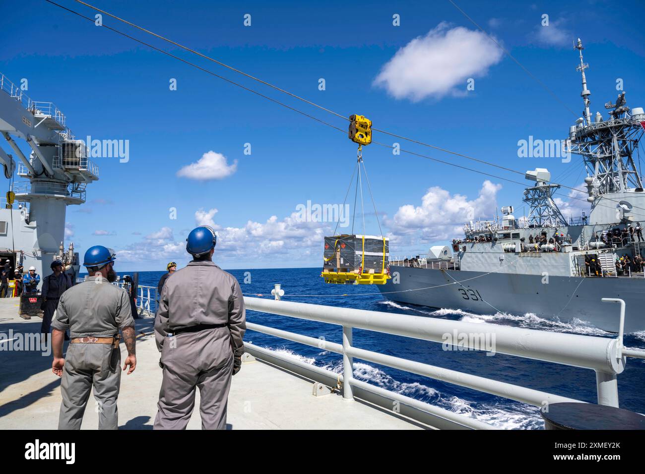 Royal Canadian Navy replenishment oiler MV Asterix transfers ammunition ...