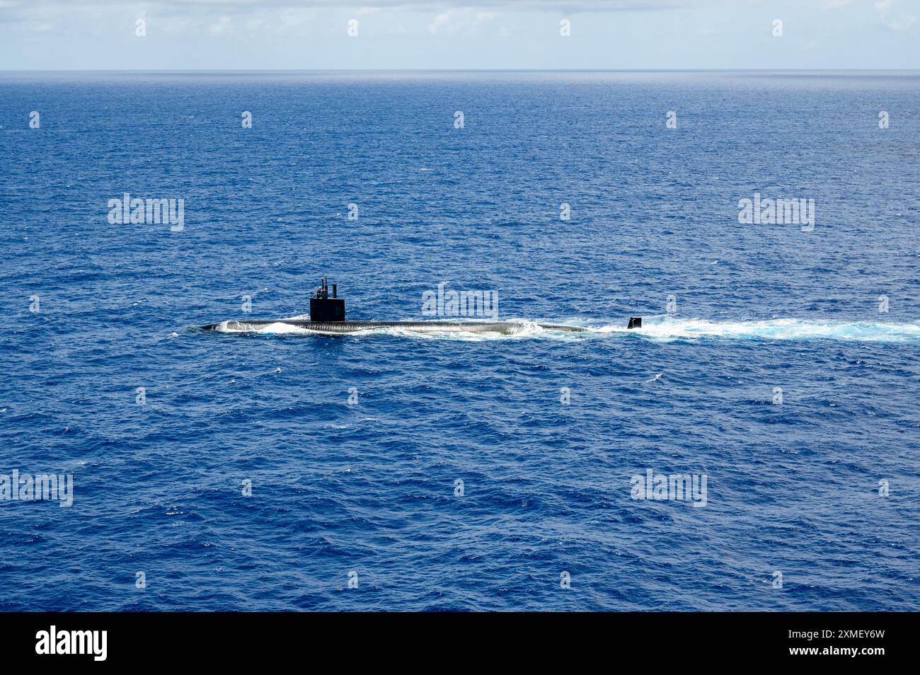 Los Angeles-class submarine USS Topeka (SSN 754) sails in formation ...