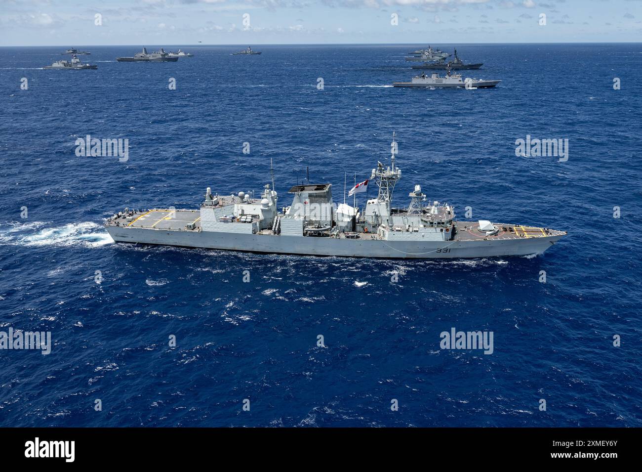 Royal Canadian Navy frigate HMCS Vancouver (FFH 331) sails in formation ...