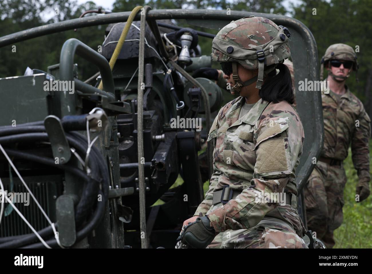 Florida Army National Guard (FLARNG) Pfc. Karen Tinoco, a cannon ...