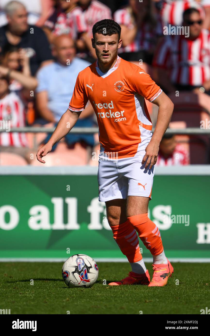 Jack Moore of Blackpool in action during the Pre-season friendly match ...