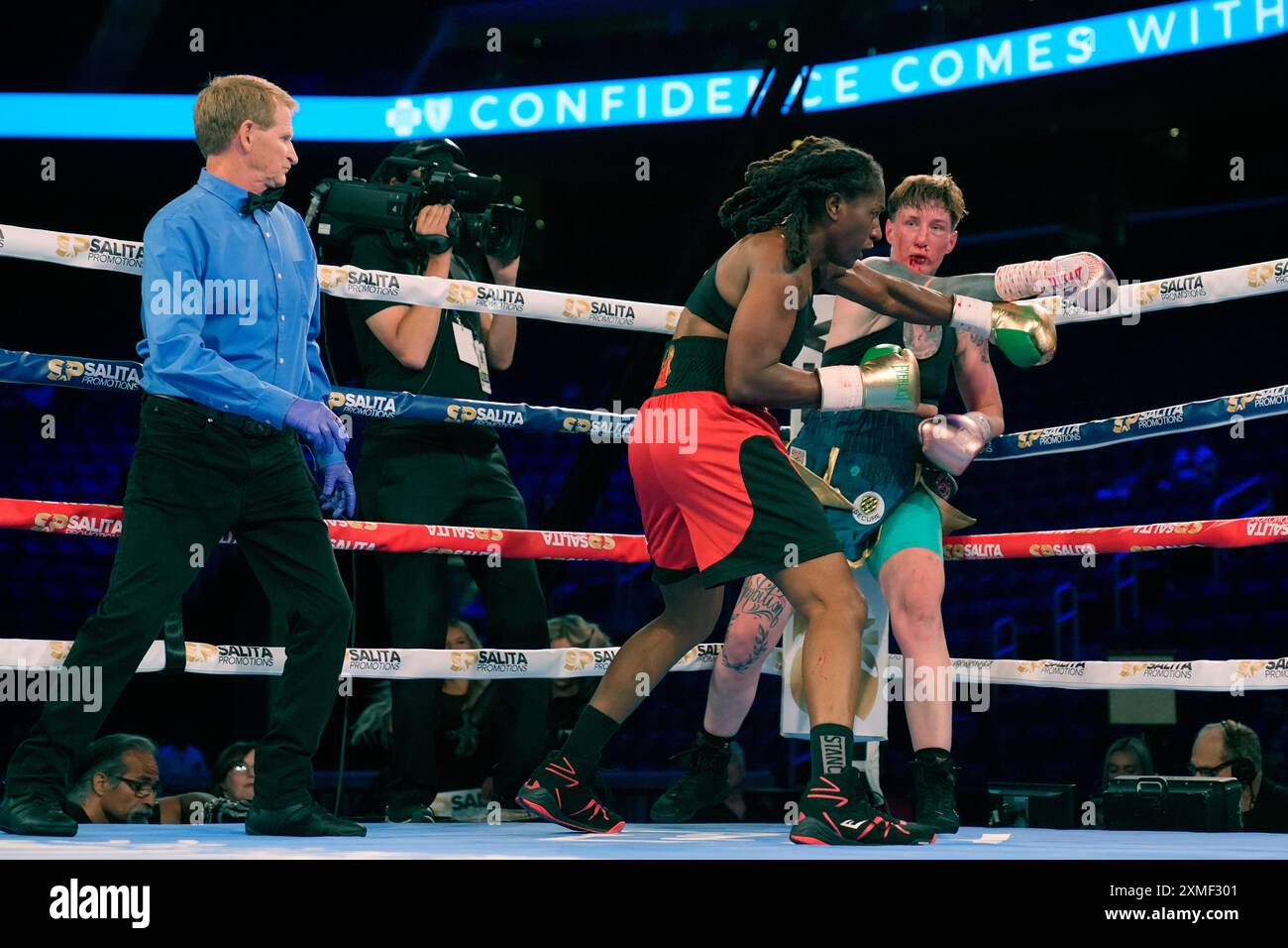 Danielle Perkins, second from right, fights Christianne Fahey, right ...