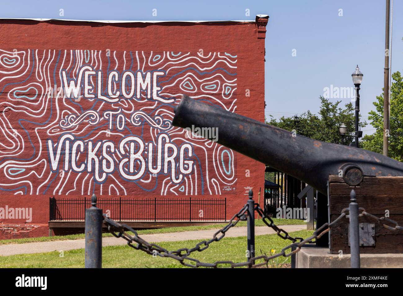 Vicksburg, Mississippi, USA - April 23, 2024: A welcome mural framed by ...