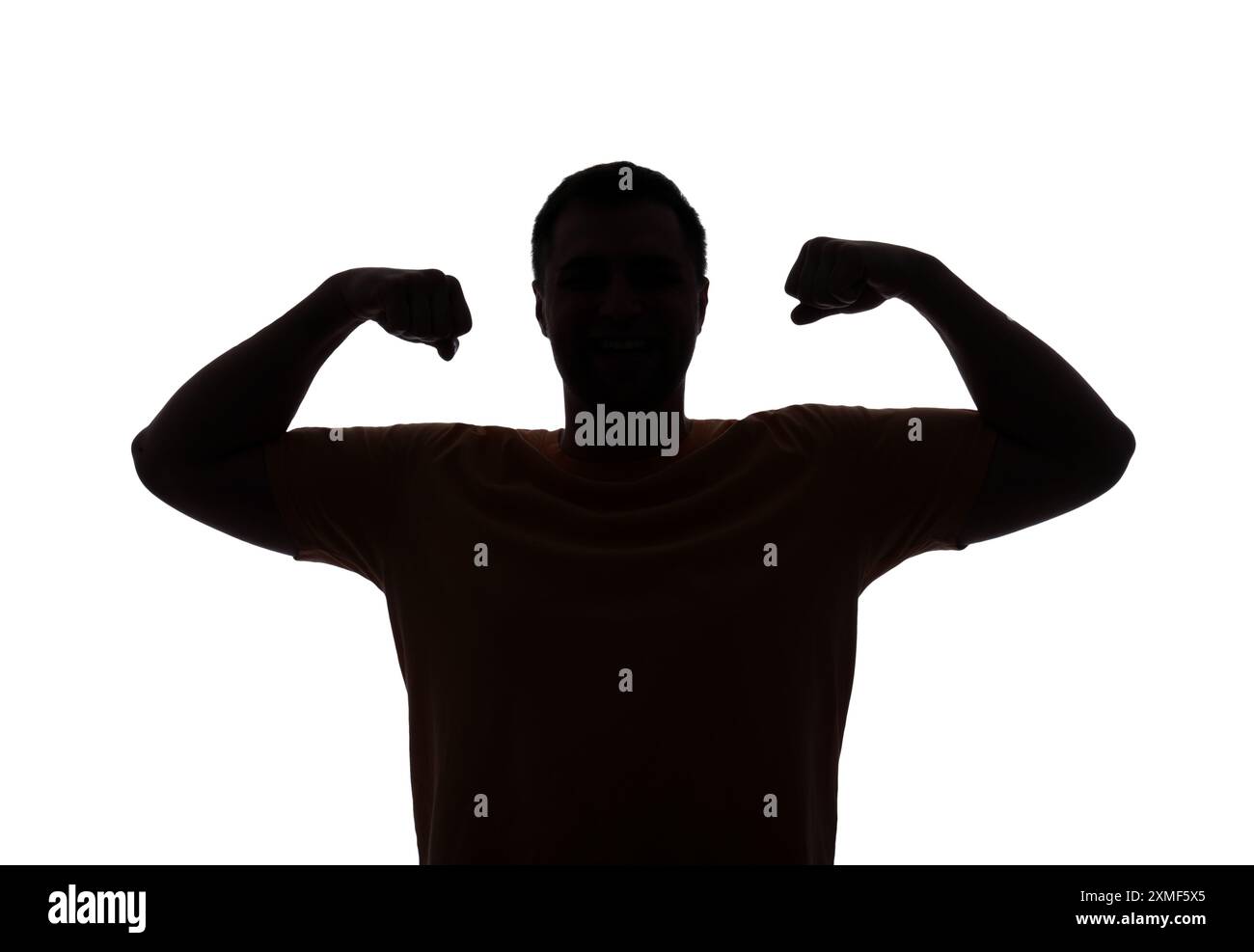 Young man showing muscles hi-res stock photography and images - Alamy