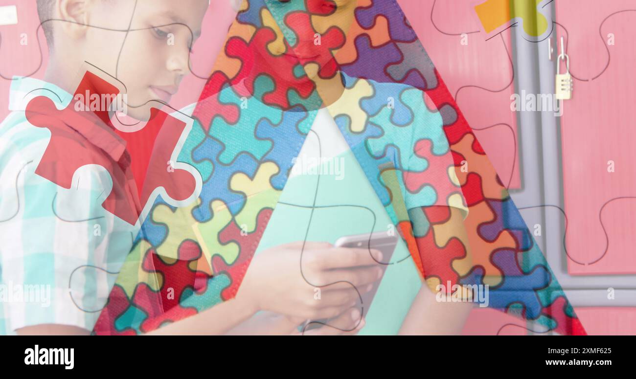 Jigsaw puzzle and ribbon icon against two diverse boys using smartphone ...