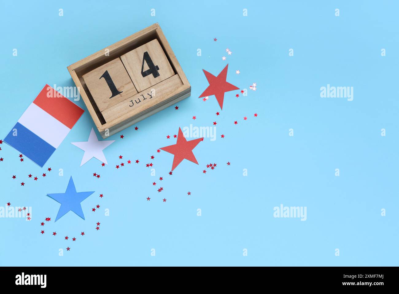Cube calendar with date 14 JULY, French flag and stars on red ...