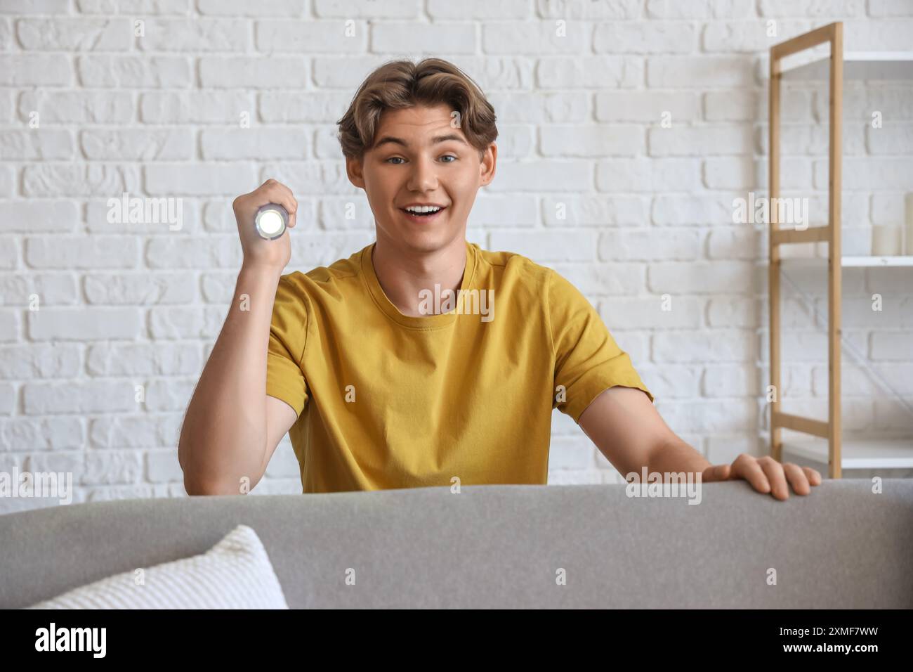 Man shining torch hi-res stock photography and images - Alamy
