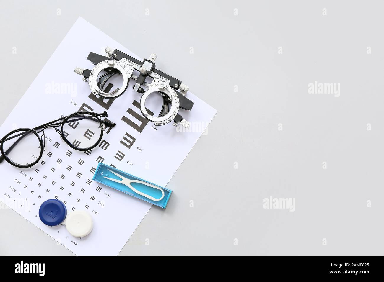 Optical trial frame with eye test chart, eyeglasses and set for contact ...