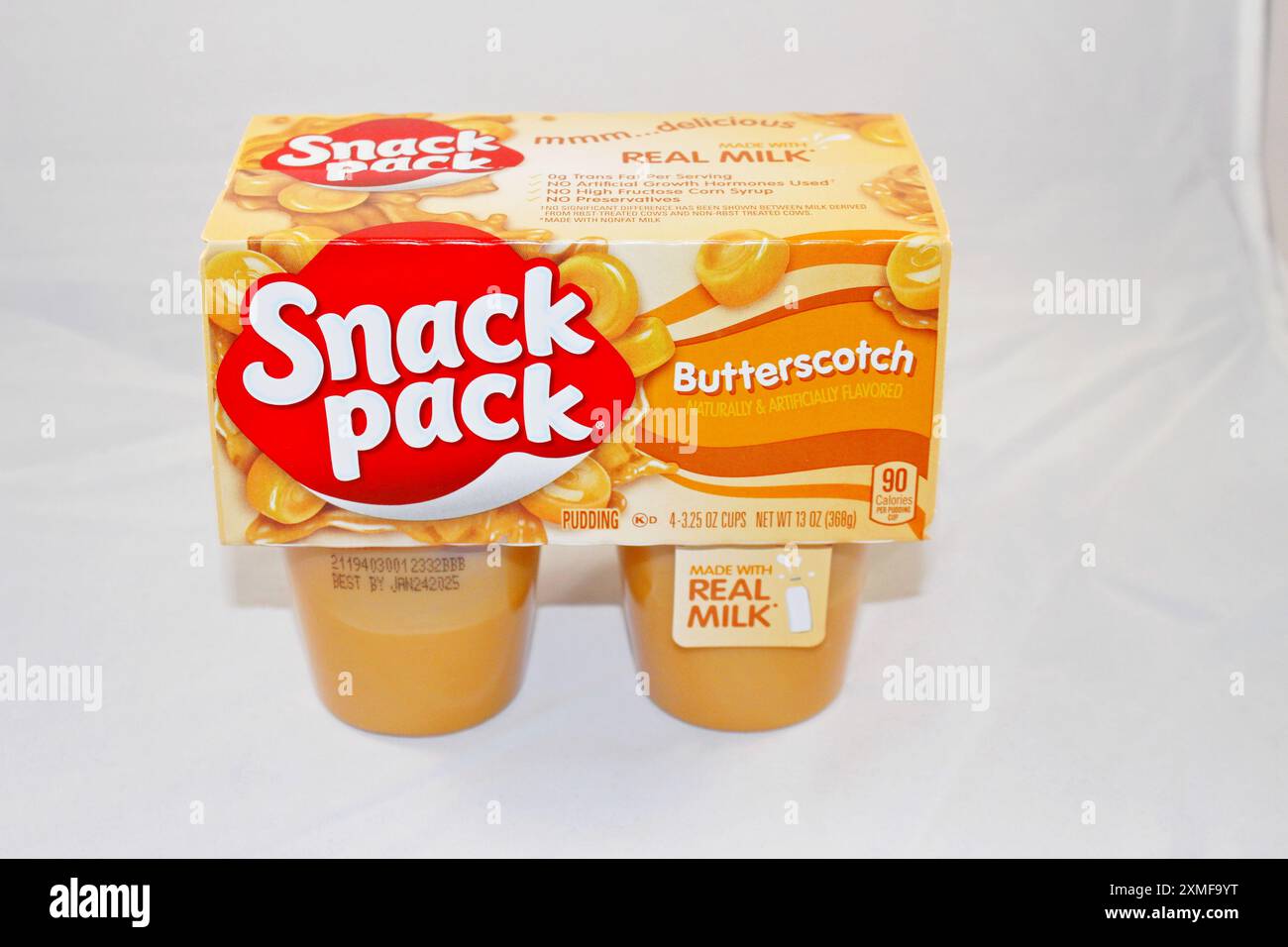 Snack pack Butterscotch shot closeup with a white background Stock ...