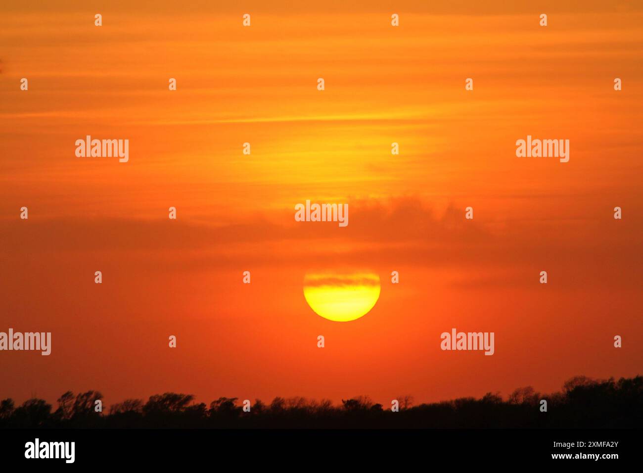 Orange sun and clouds hi-res stock photography and images - Alamy