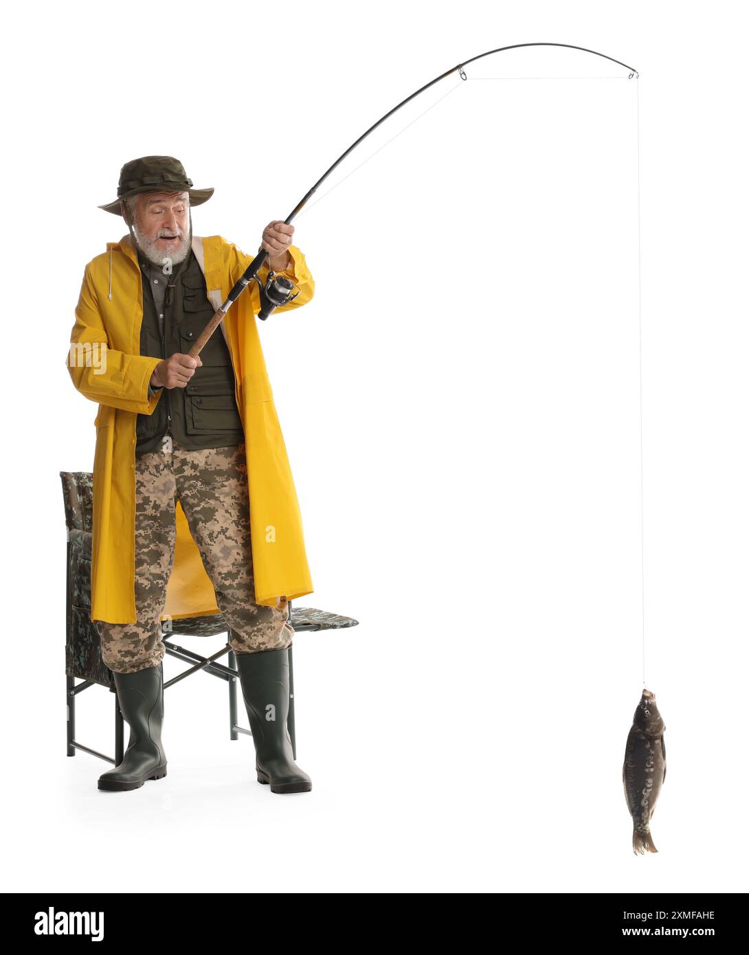 Fisherman with rod and catch on white background Stock Photo - Alamy
