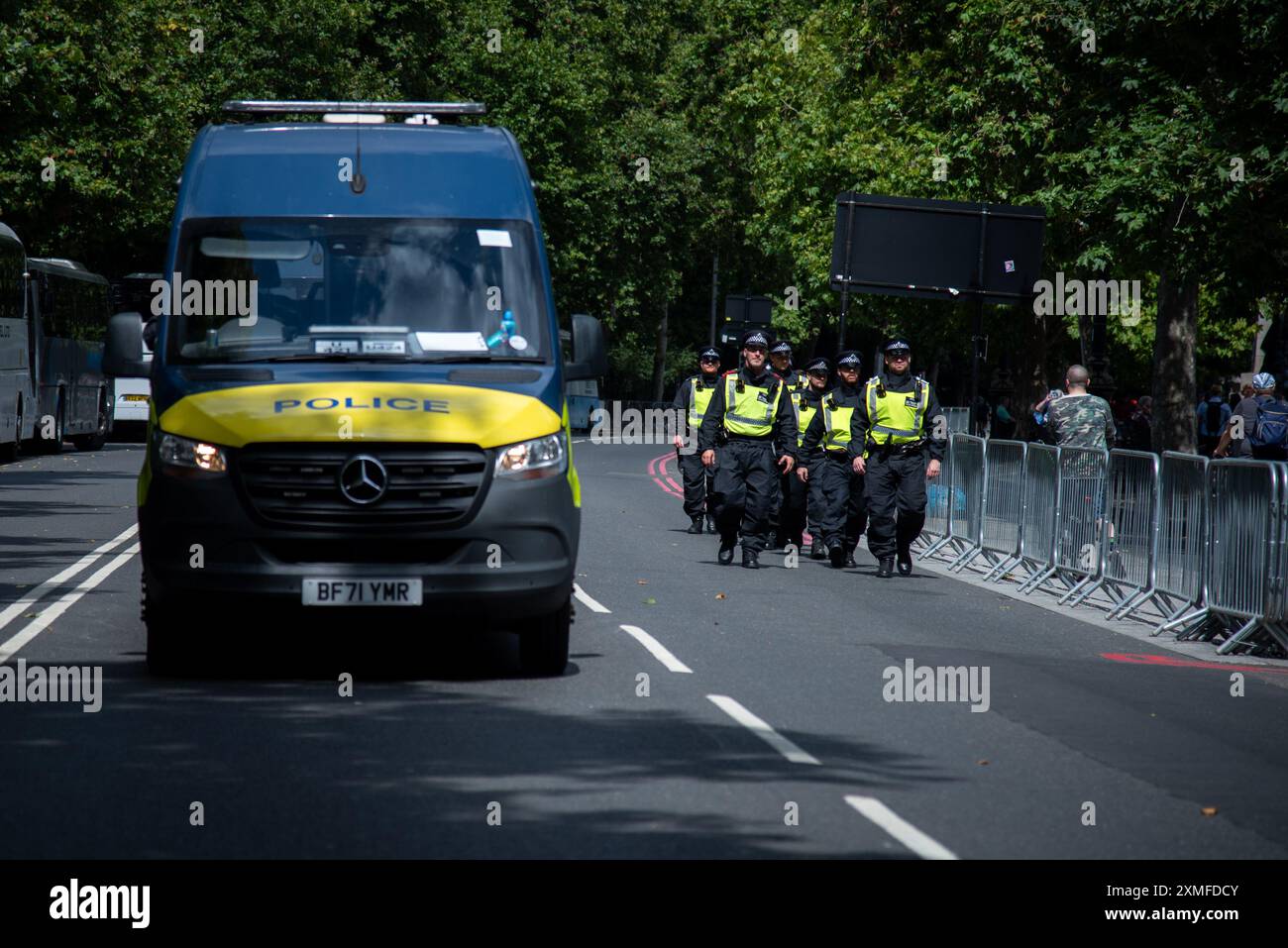 The Metropolitan Police stand on guard during the demonstration. Tommy ...