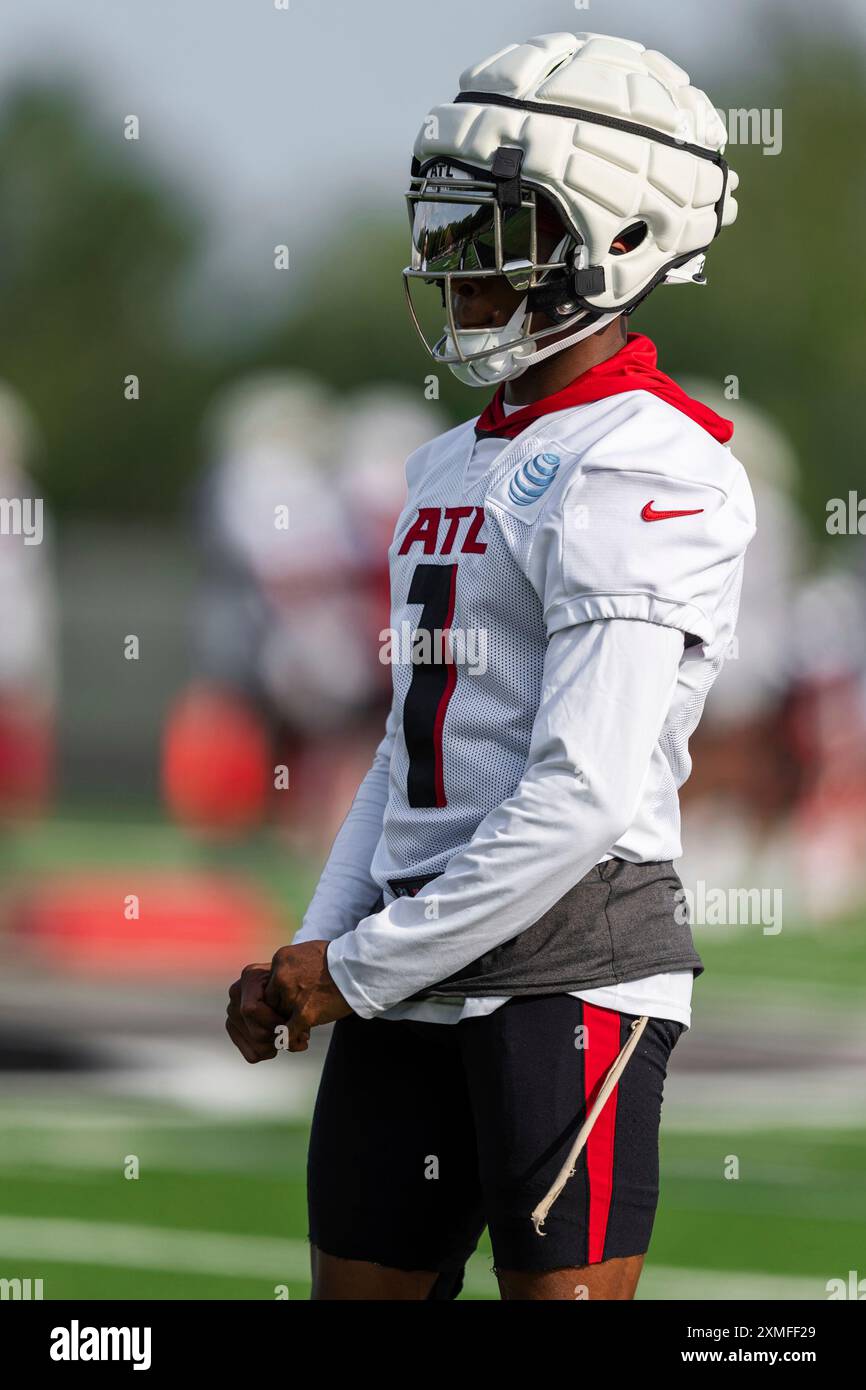 Atlanta Falcons wide receiver Darnell Mooney (1) listens to coaches' feedback during an NFL ...