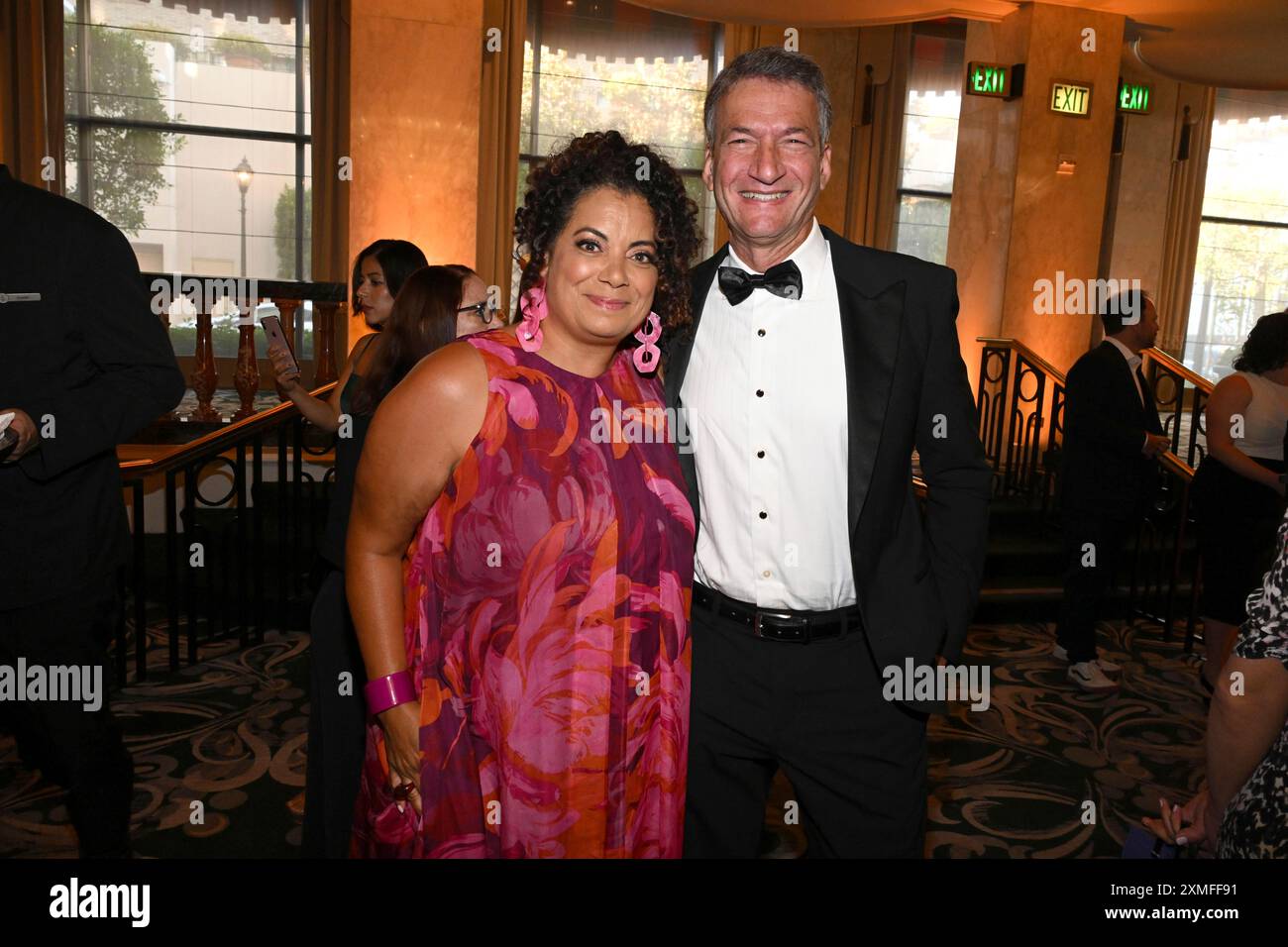 Michaela Pereira, on left, and Eric Spillman attends the 76th Los ...