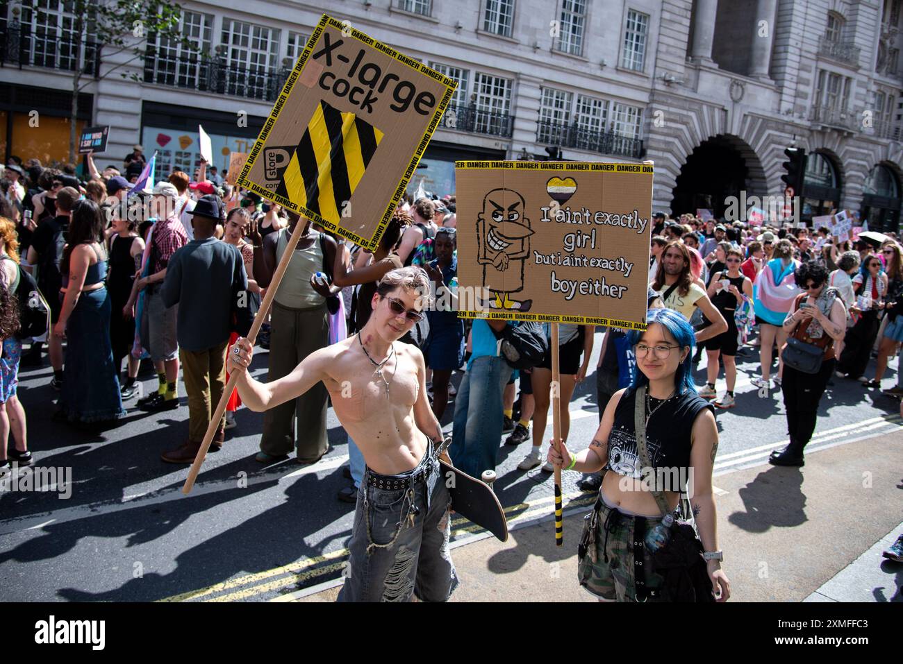 London, UK. 27th July, 2024. Participant march with placards during the ...