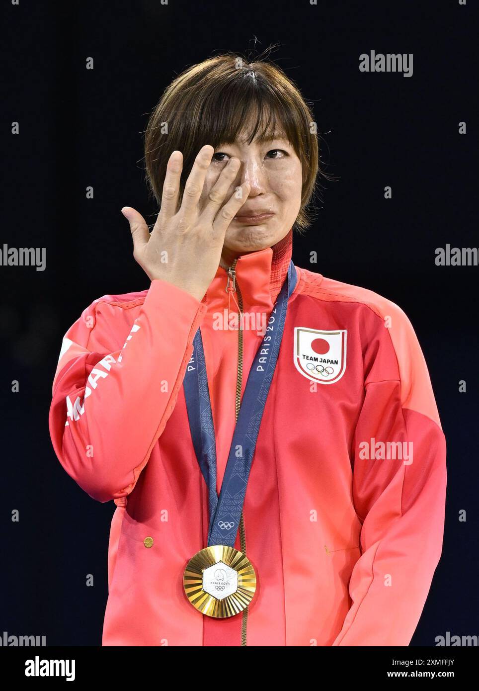 Japan's Natsumi Tsunoda sheds a tear during the medal ceremony after ...