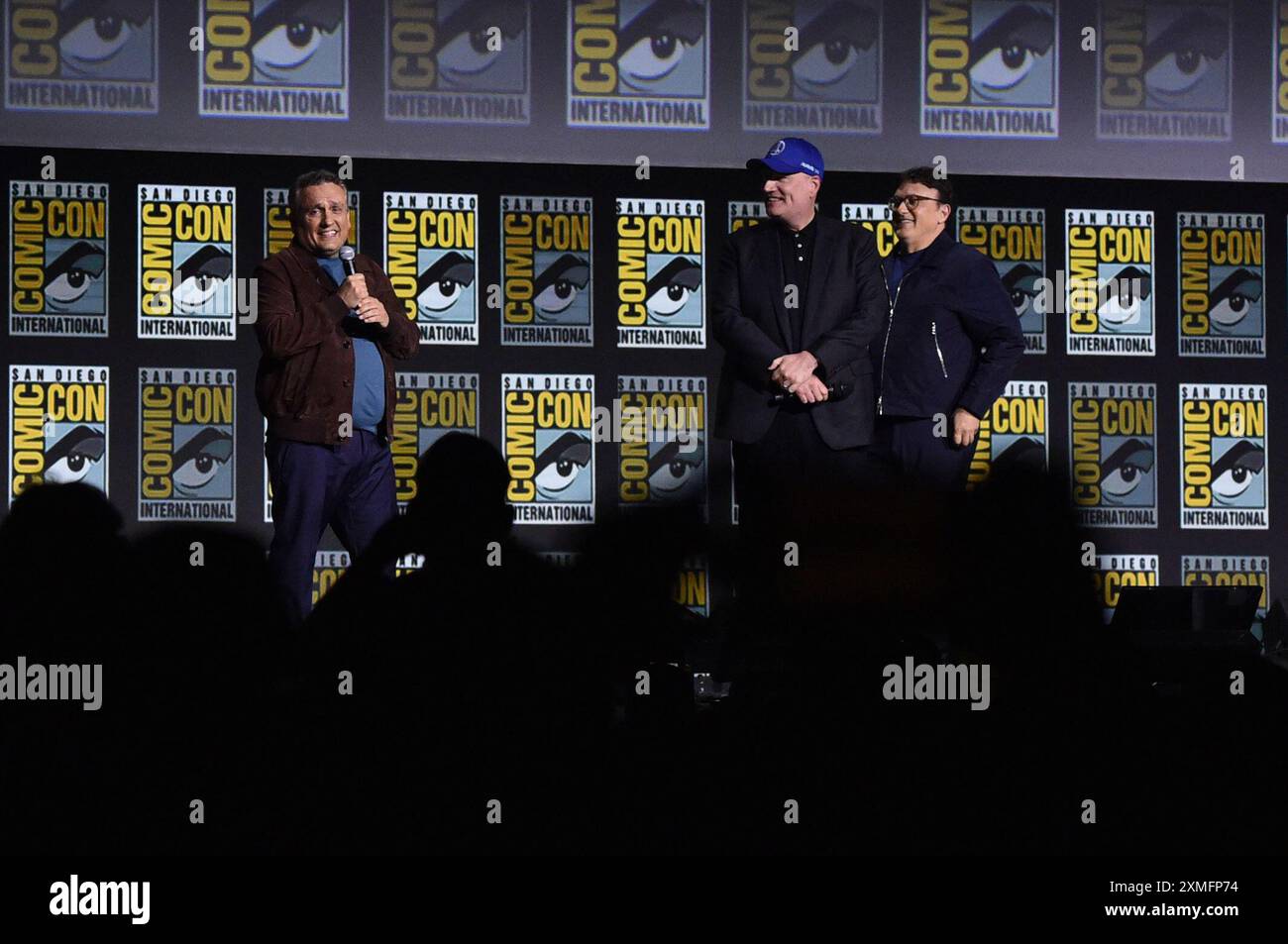 Joe Russo, from left, Kevin Feige, and Anthony Russo attend a panel for ...