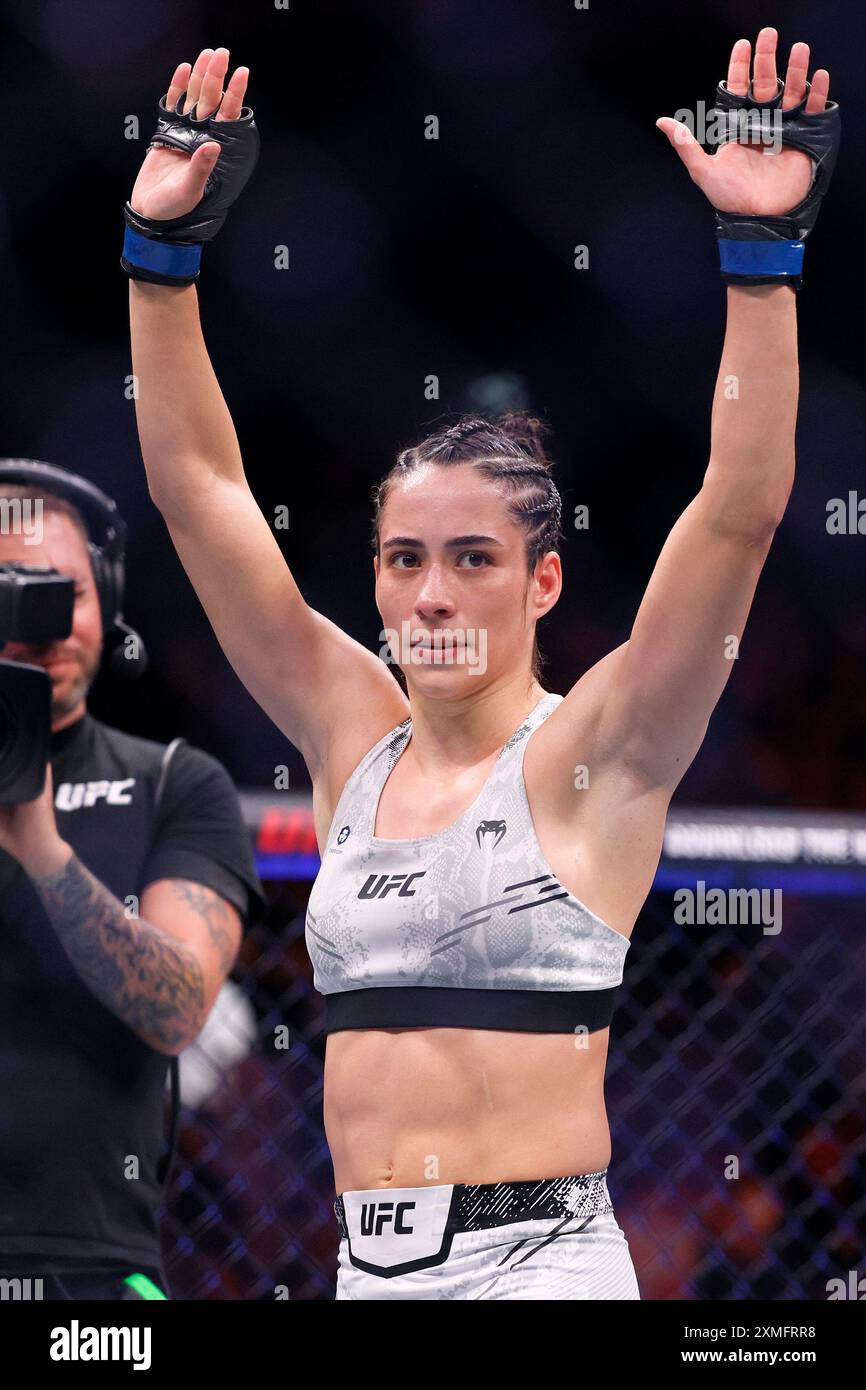 Bruna Brasil wins the Women's Strawweight fight agains Molly McCann ...