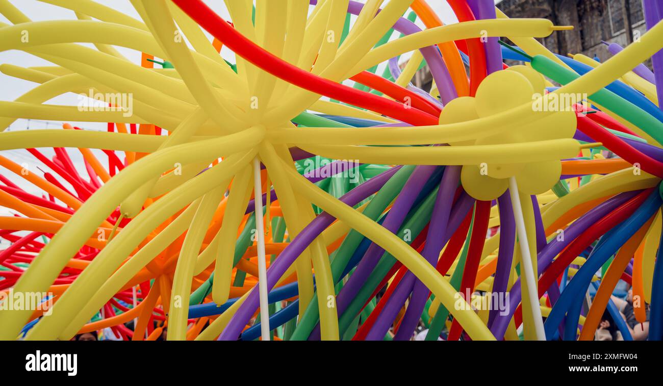 A group of vibrant balloons are linked with each other Stock Photo - Alamy
