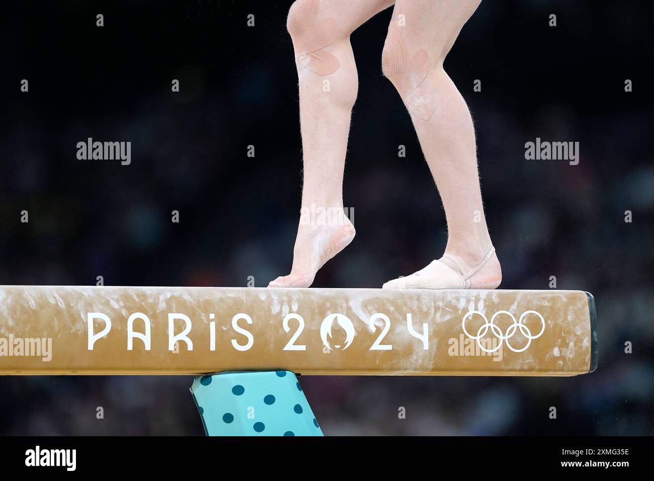Ana Barbosu, of Romania, competes on the balance beam during a women's ...