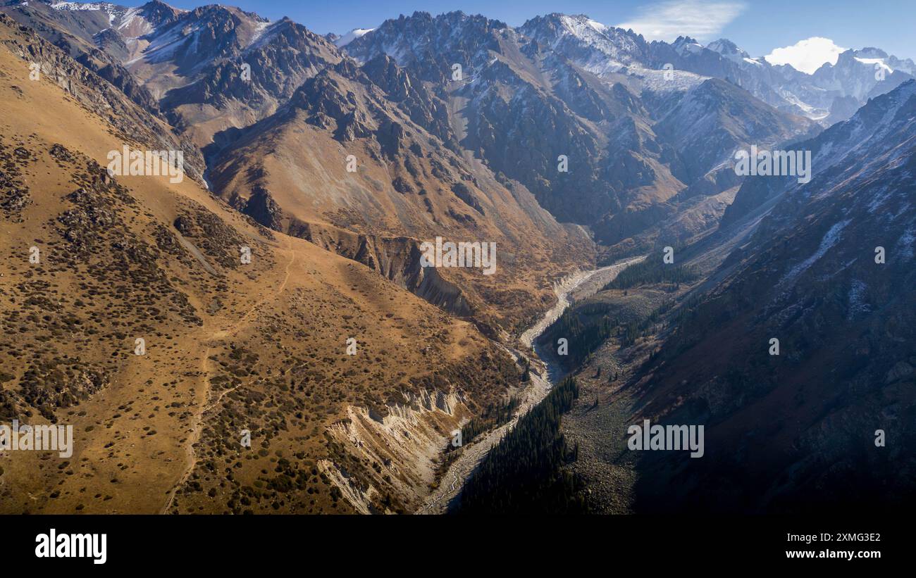 The aerial photo of mountain valley at Ala-Archa National Park, Kyrgyzstan, with river running ...