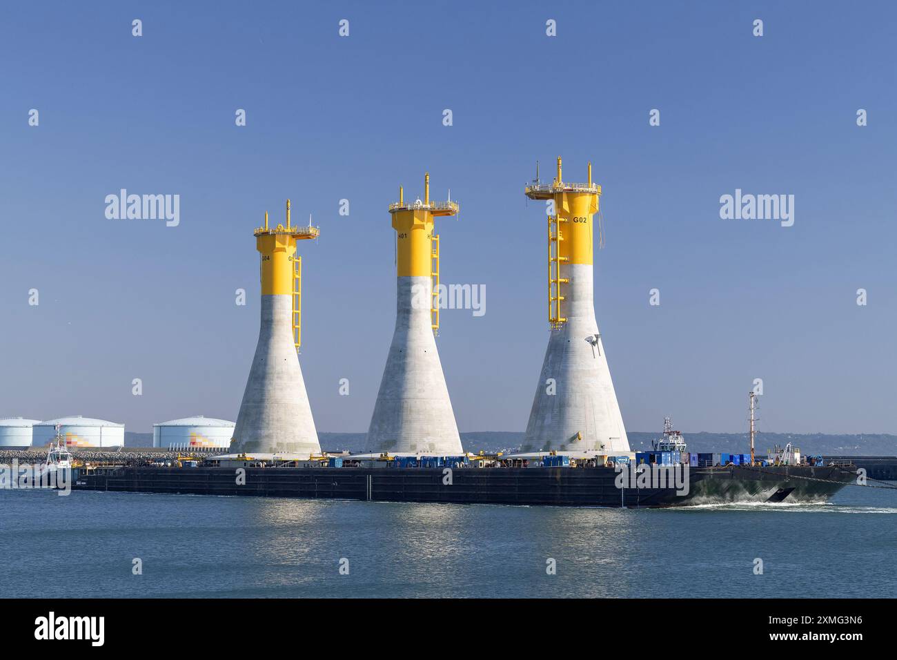 View of the barge S44 towed by the tug BEAR for the transport of ...