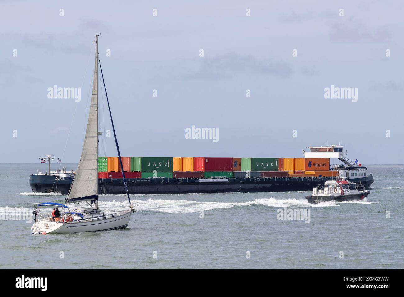 Le Havre - Inland container ship OURAL arriving port of Le Havre with a ...