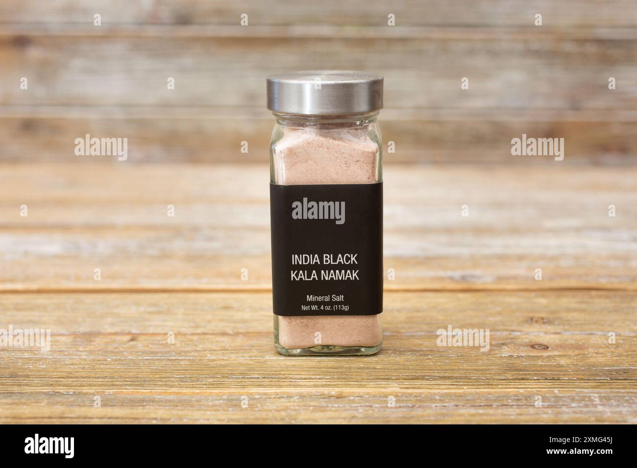A view of a jar of kala namak black salt Stock Photo - Alamy